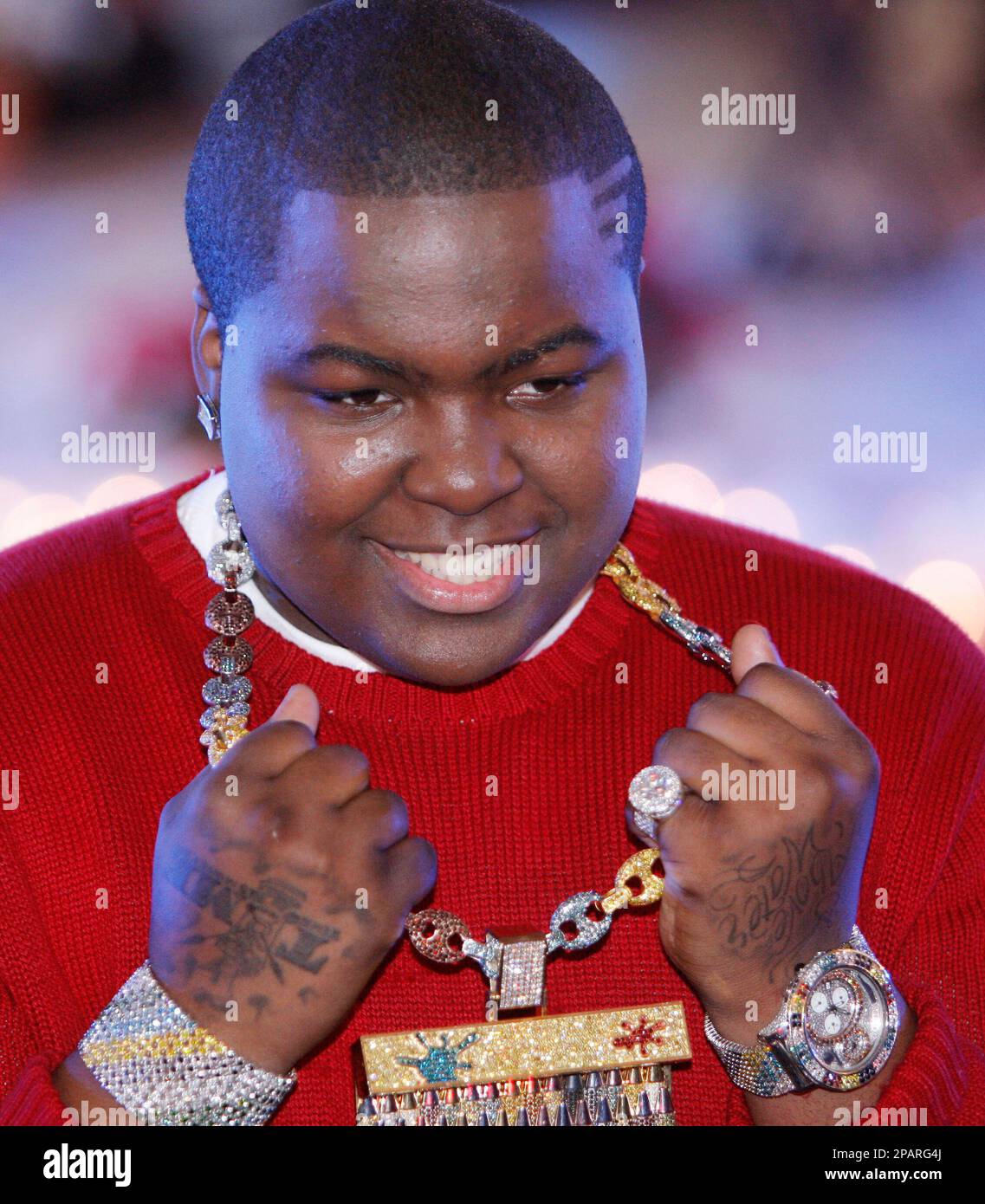 Rapper Sean Kingston poses for photographers during the 75th ...