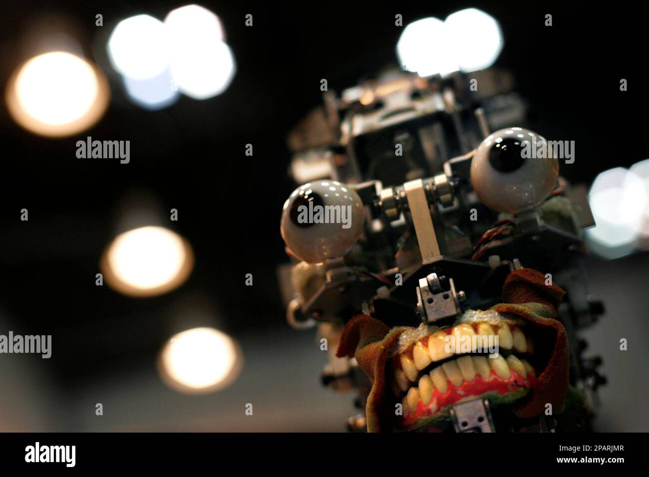 A humanoid robot, without its facial skin, is displayed at Japan's ...