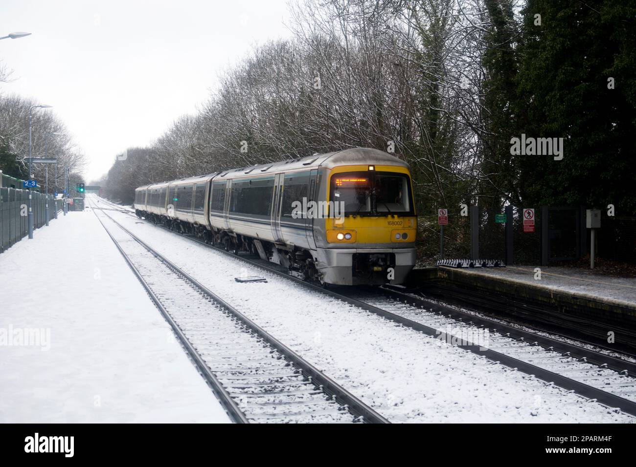 Chiltern Railways class 168 diesel train in snowy weather, approaching ...