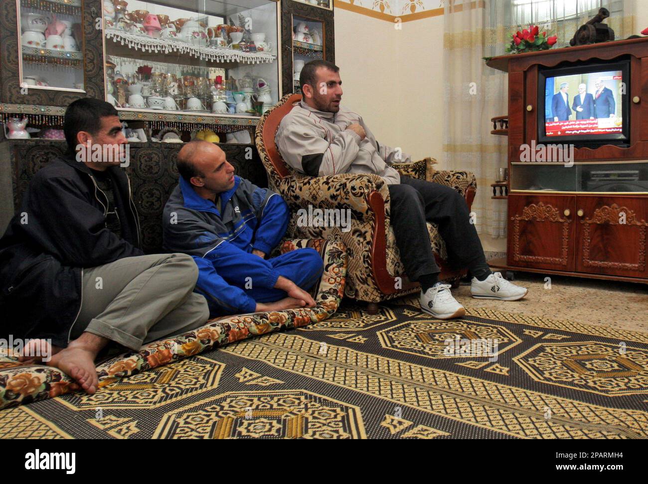 Palestinian Mohammed Nahal, right, and his friends watch the U.S ...