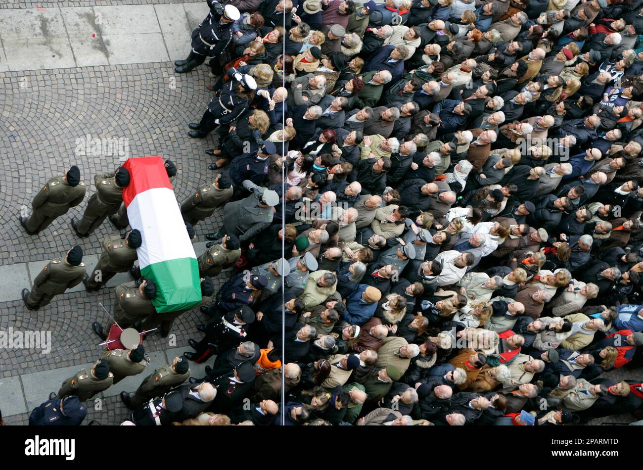 An Italian flag wraps the coffin of Daniele Paladini, the Italian ...
