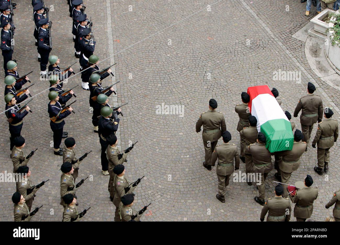 An Italian flag wraps the coffin of Daniele Paladini, the Italian ...