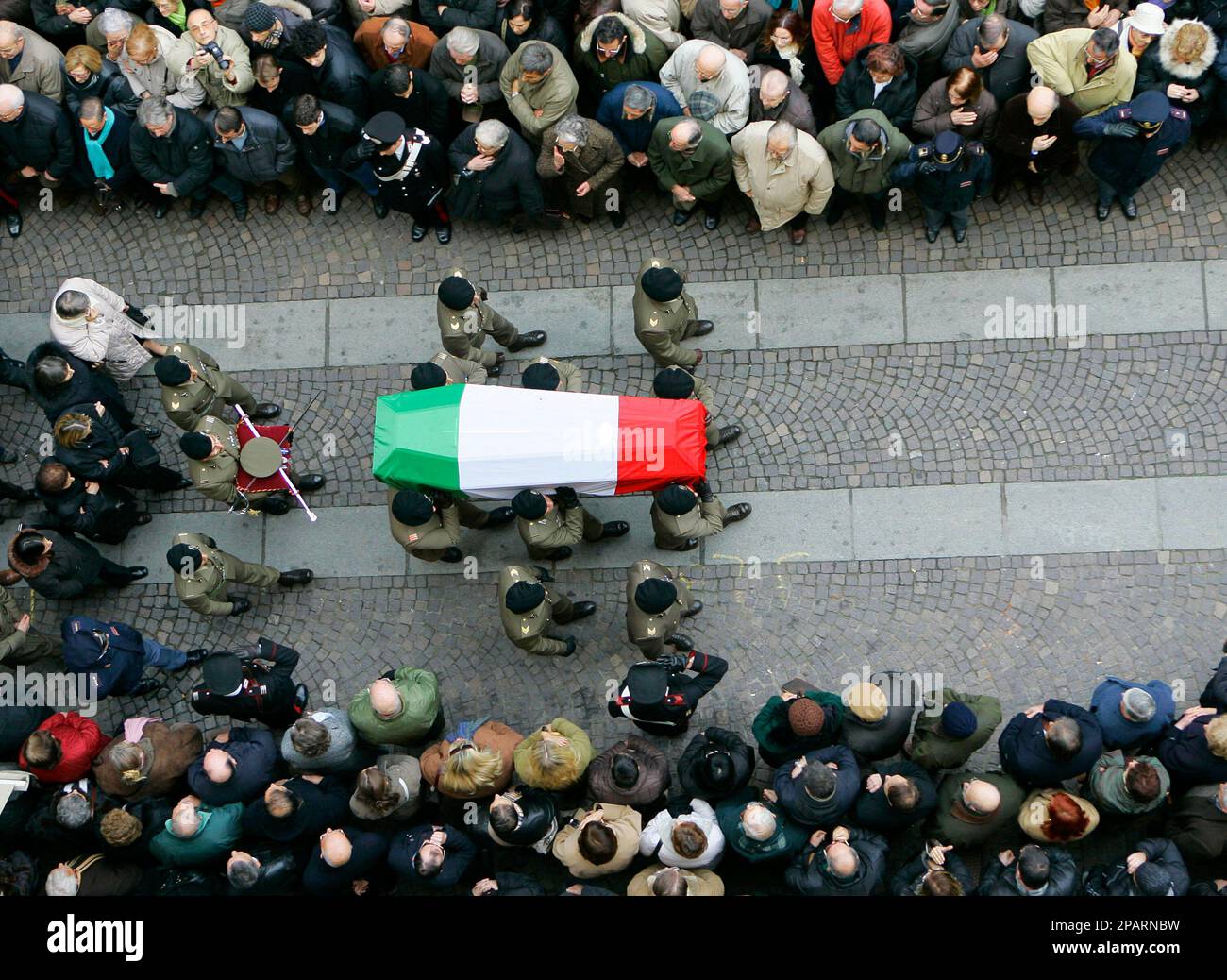 An Italian flag wraps the coffin of Daniele Paladini, the Italian ...