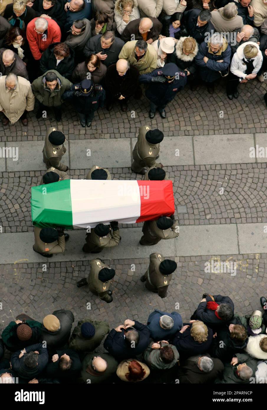 An Italian flag wraps the coffin of Daniele Paladini, the Italian ...