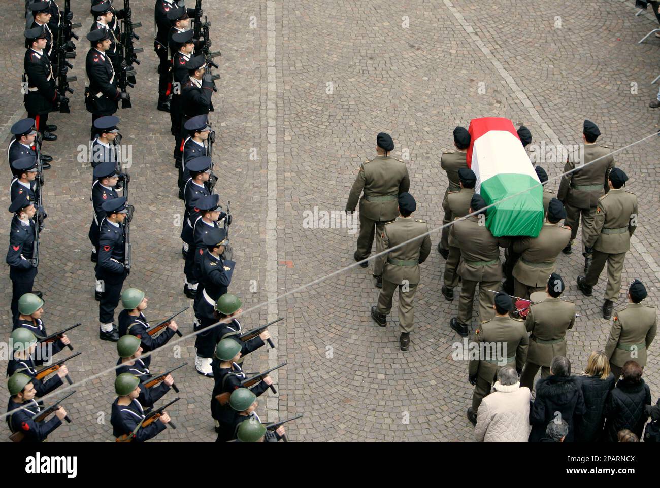 An Italian flag wraps the coffin of Daniele Paladini, the Italian ...