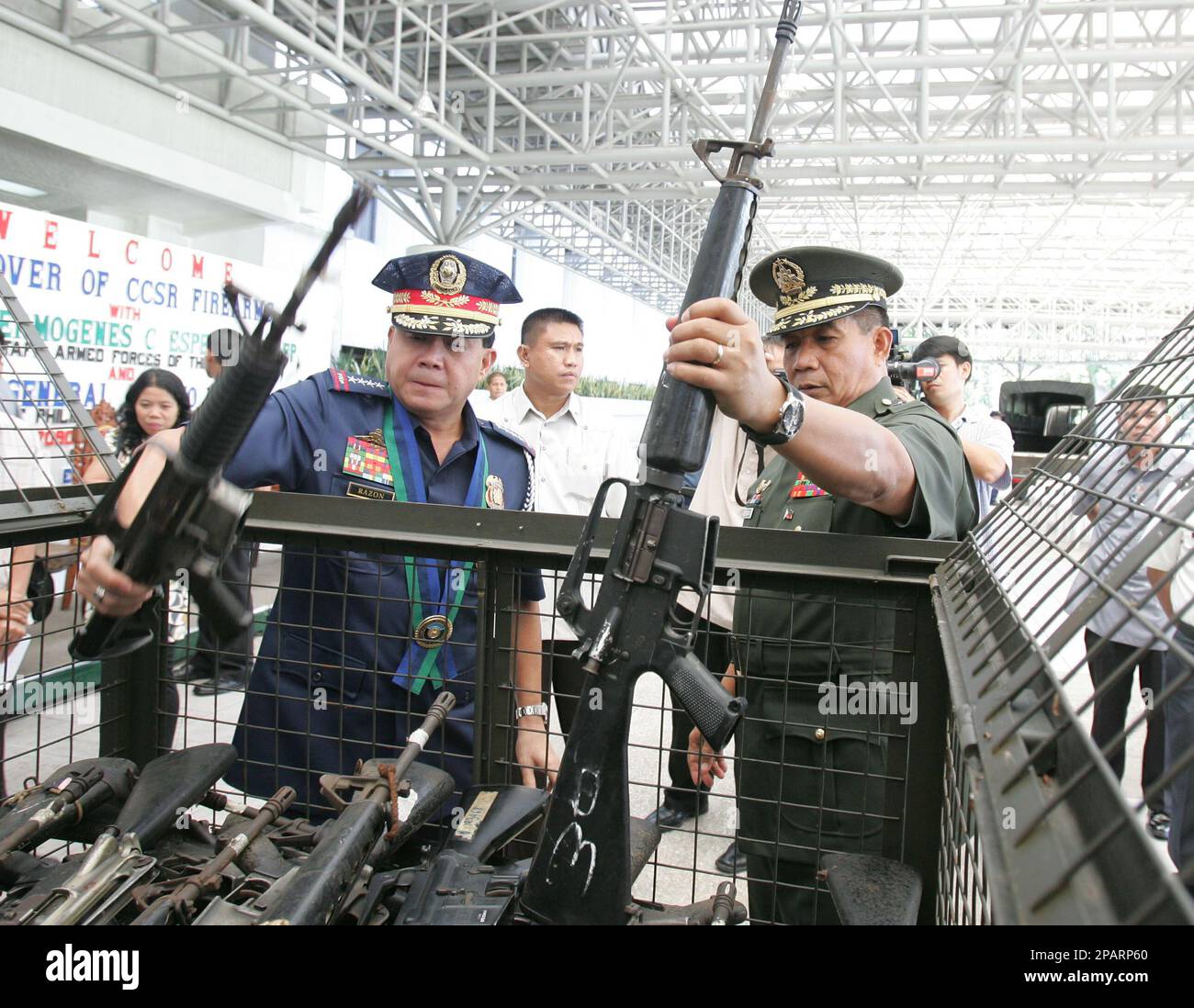 Philippine Armed Forces Chief Gen. Hermogenes Esperon, left, and new ...
