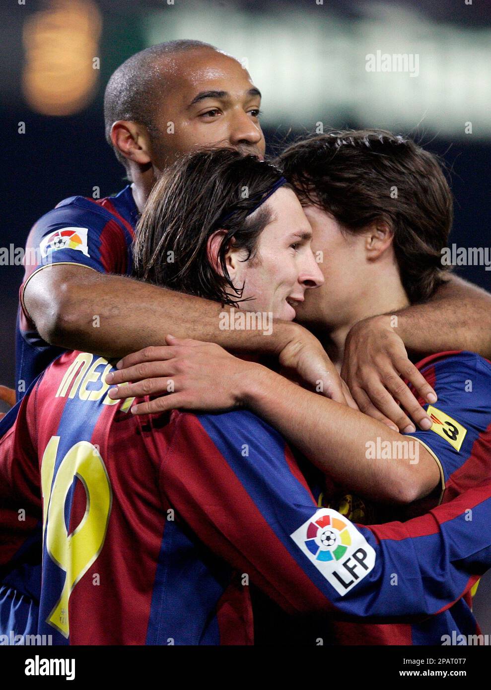 FC Barcelona player Lionel Messi, right, celebrates his goal with his ...