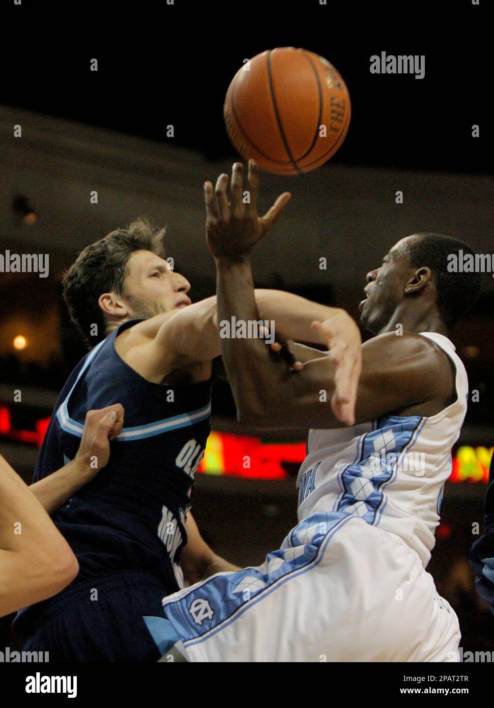 North Carolina's Marcus Ginyard, right, is fouled by Old Dominion's Sam ...