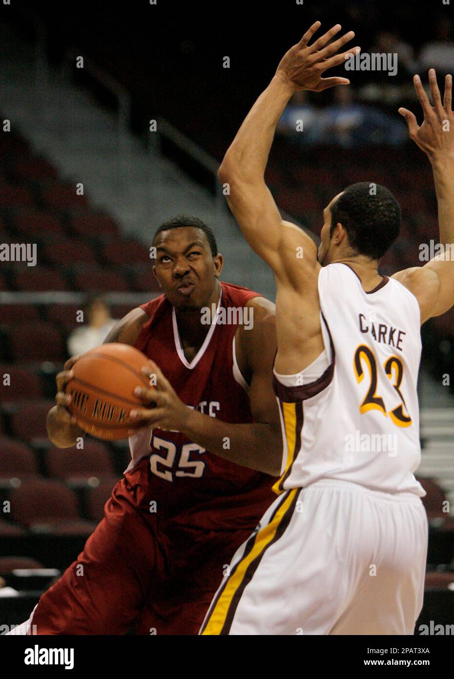 Iona's Devon Clarke, right, pressures South Carolina State's Julius ...