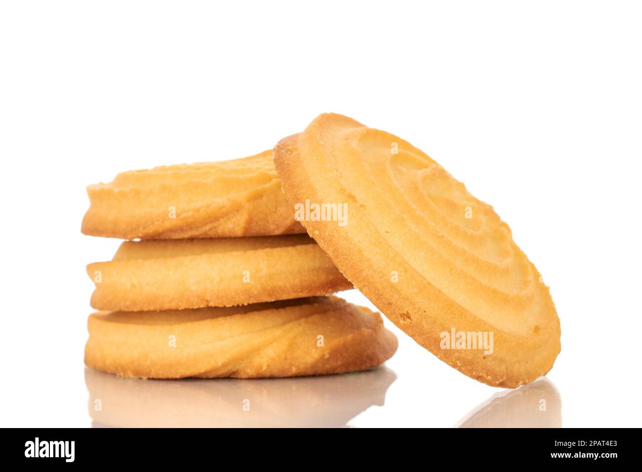 Four sweet cookies with butter, macro, isolated on white background ...