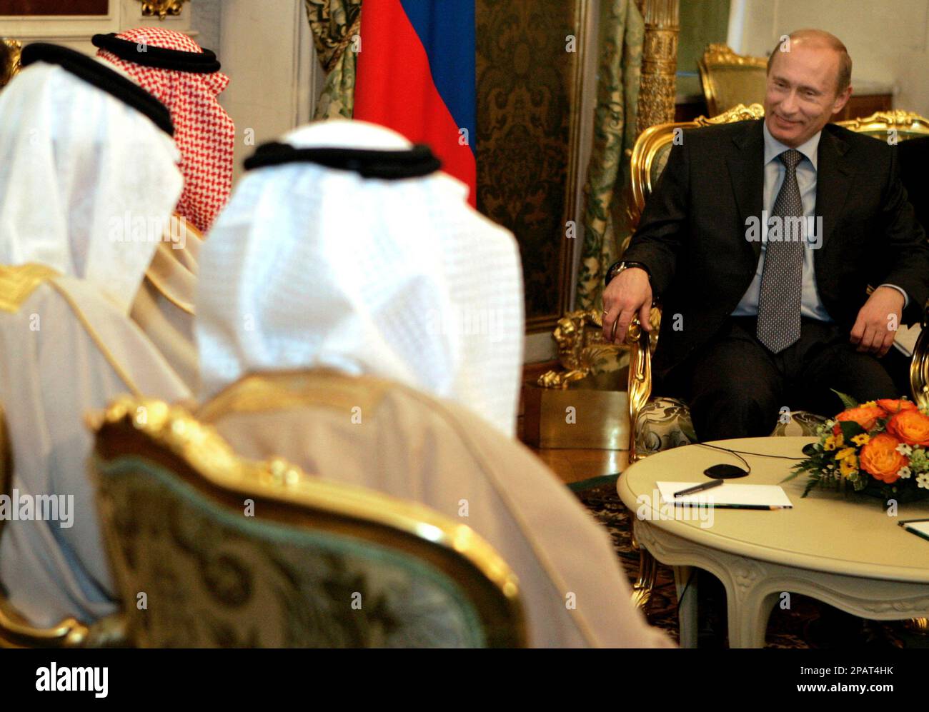 Russian President Vladimir Putin, right, seen meeting with Saudi ...