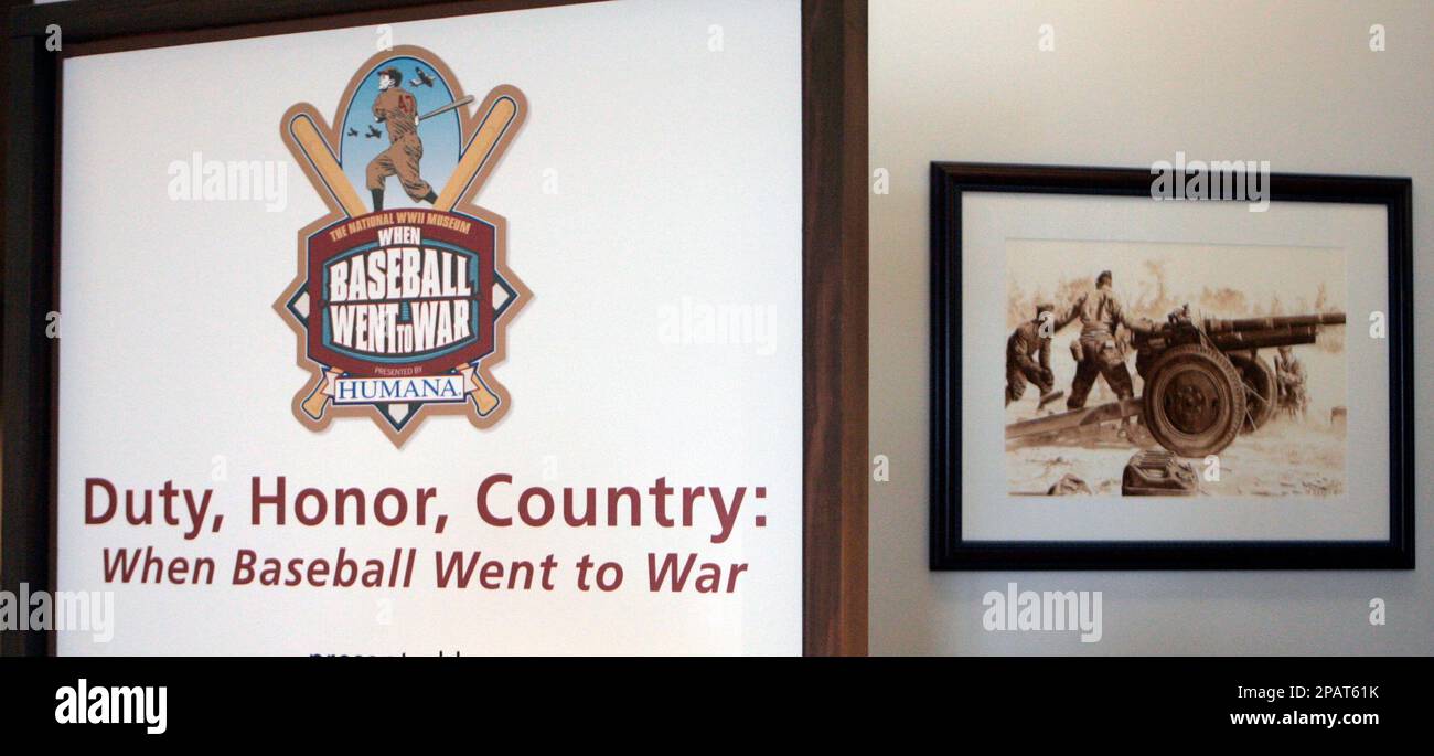 The sign locating the "When Baseball Went to War" exhibit is shown next ...