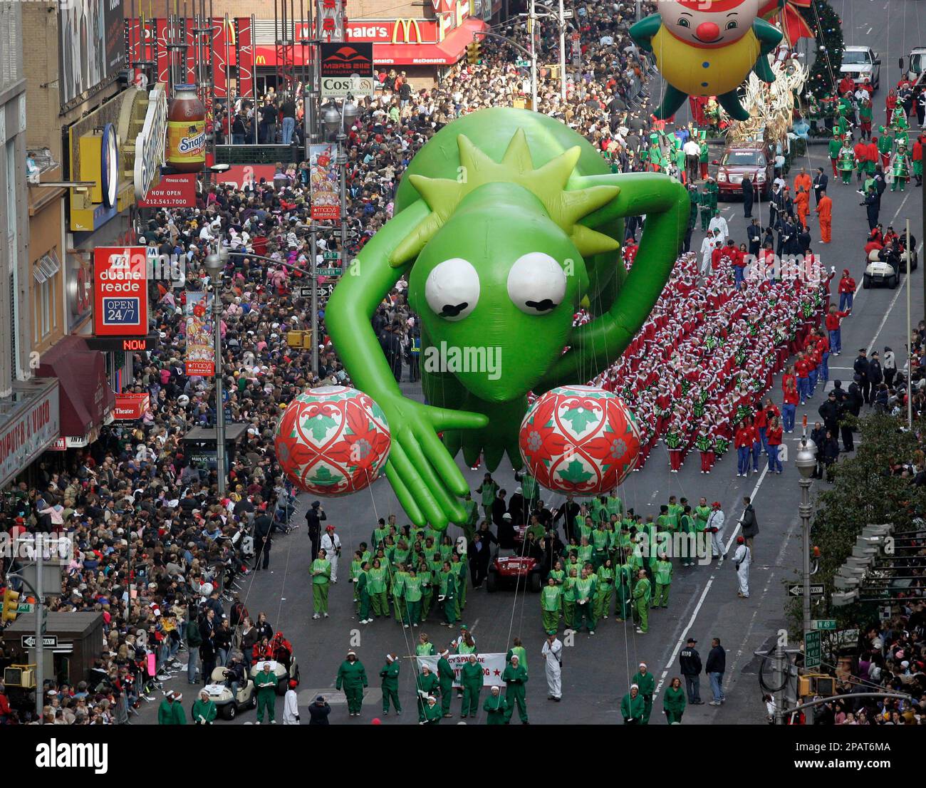 The Kermit the Frog balloon makes its way down Broadway during the Macy ...