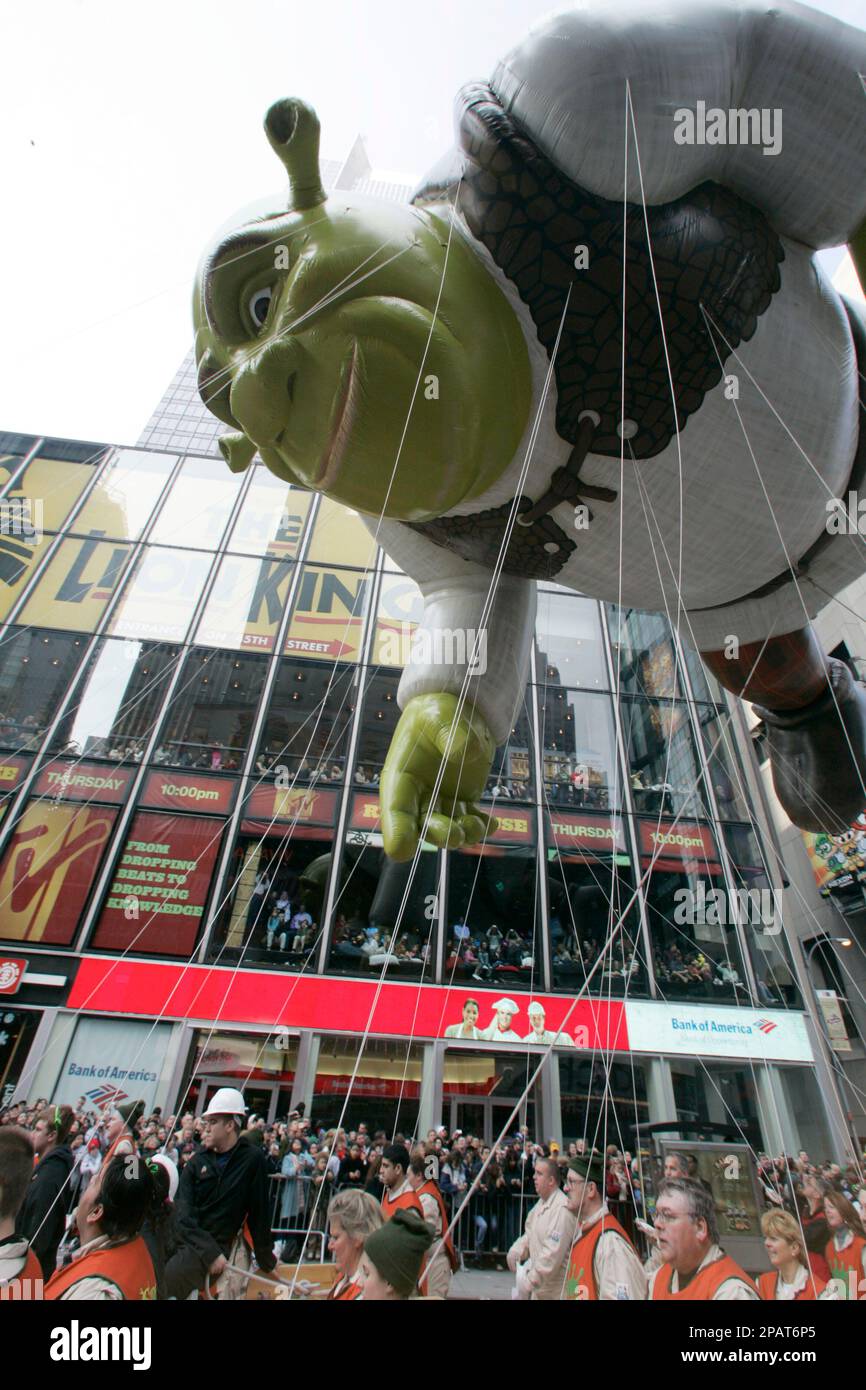 The Shrek balloon moves through Times Square during the Macy's ...