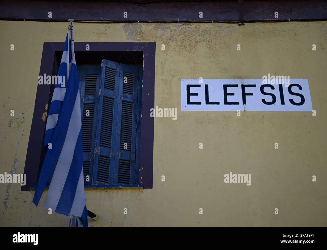 Sign written in Greek language at the Old Railway Station of Eleusis in ...