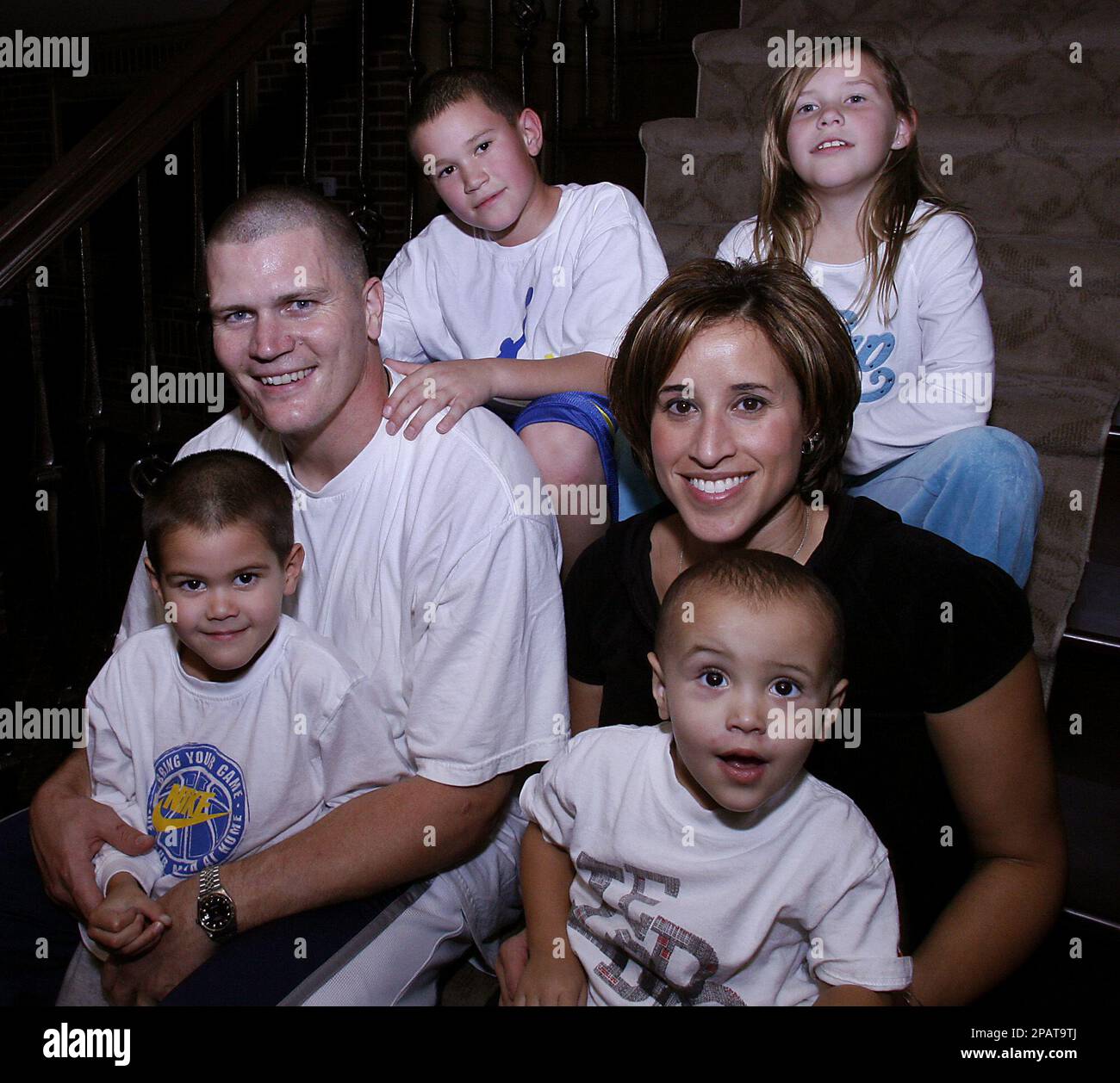Detroit Lions quarterback Jon Kitna with family, clockwise from top ...