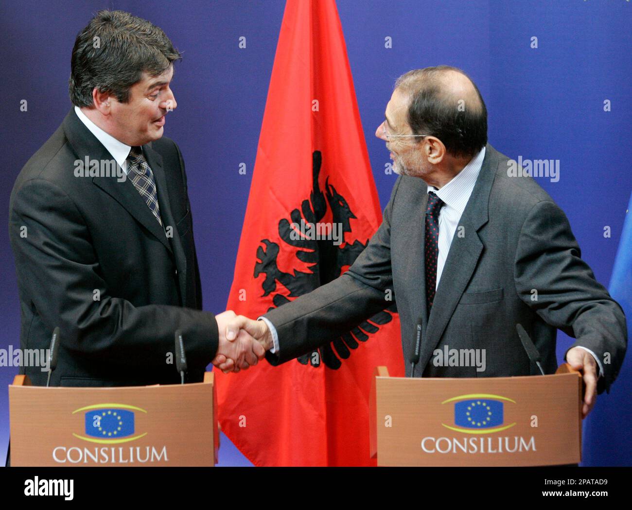 EU foreign policy chief Javier Solana, right, shakes hands with Albania ...