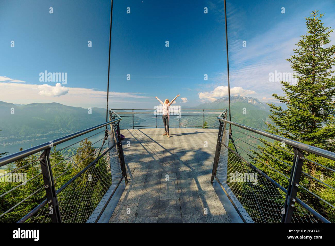 Woman on Aussichtsplattform Cardada platform on top of Cardada-Cimetta ...