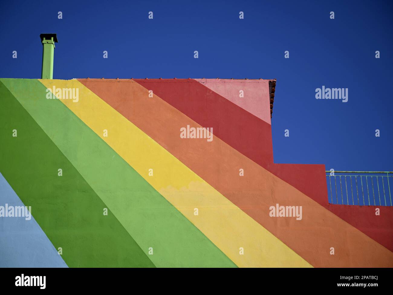 Urban building colorful painted exterior wall Stock Photo - Alamy