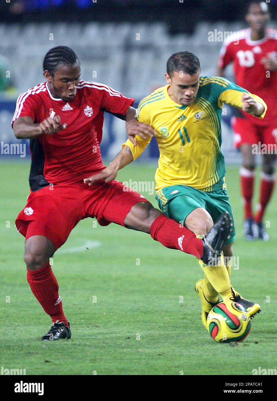 South Africa's Lance Davids, right, takes possession of the ball from ...