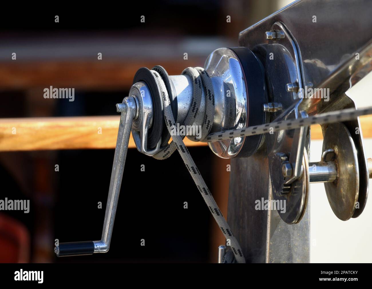 Sailing boat manual operated hand crank with a rope Stock Photo - Alamy