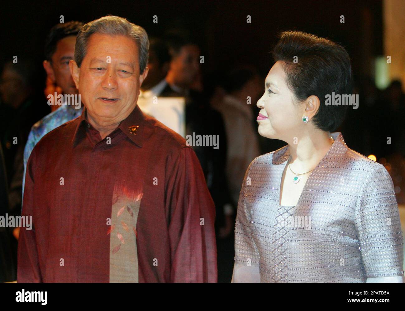 Thailand's Prime Minister Surayud Chulanont, left, is seen with his ...