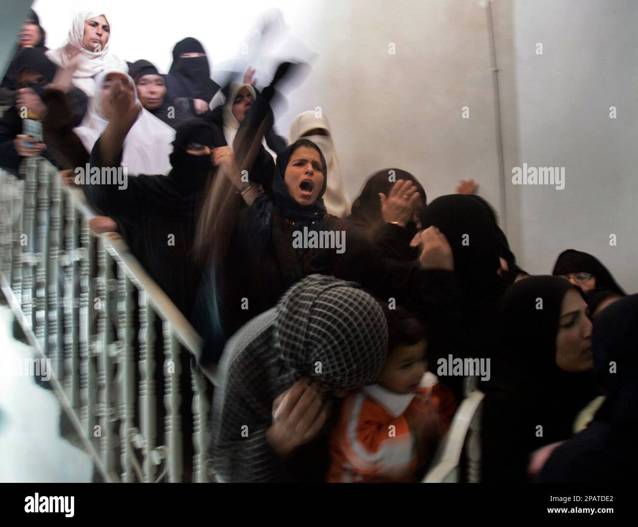 Relatives of Hamas militant Mahmmed Al Najar mourn during his funeral ...
