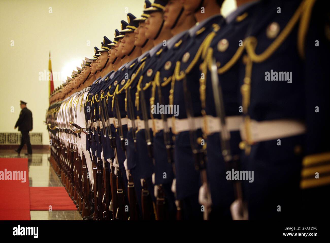 A guard of honor stand before the welcoming ceremony for Ecuadorian ...