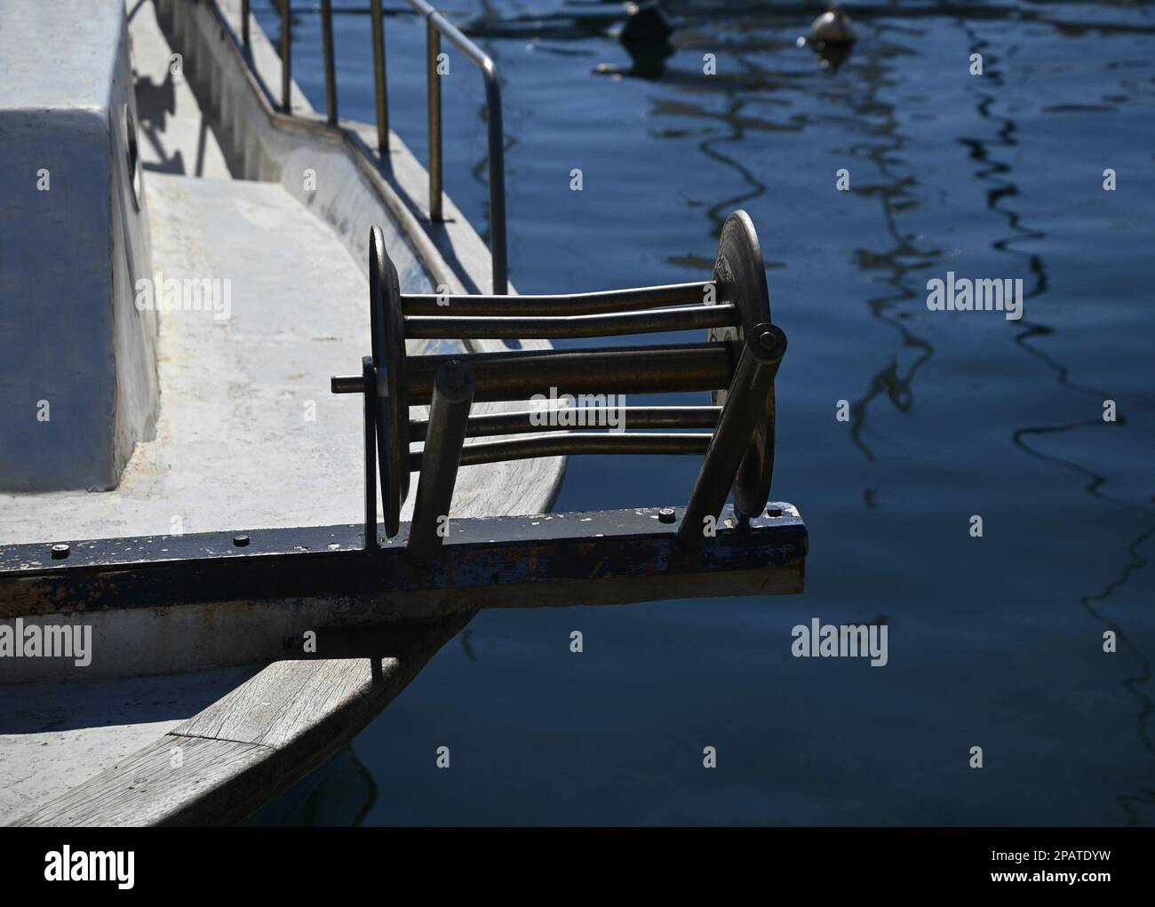 Traditional Greek wooden fishing boat nets bow manual winch trawler ...