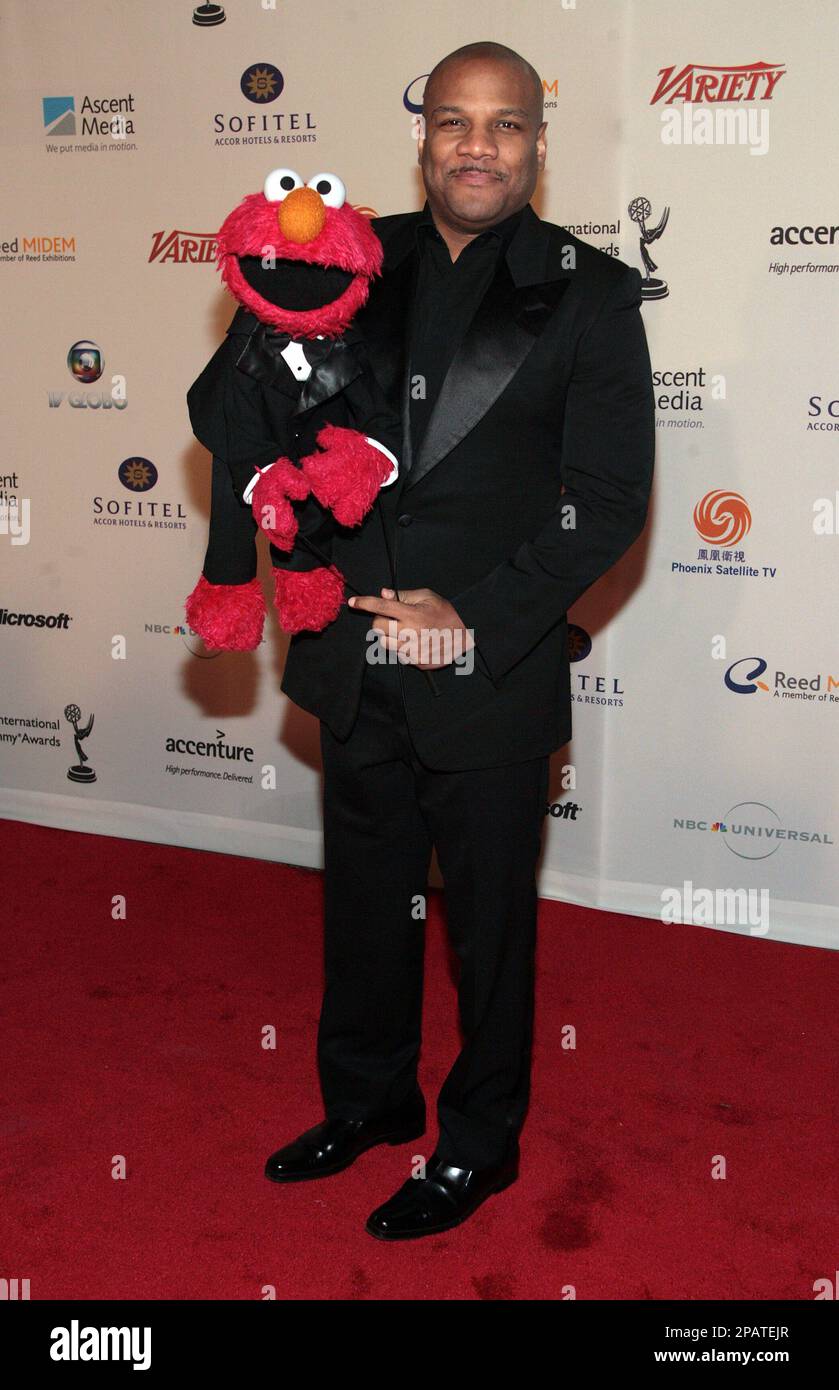 Kevin Clash, the puppeteer who portrays "Elmo," arrives at the 35th ...