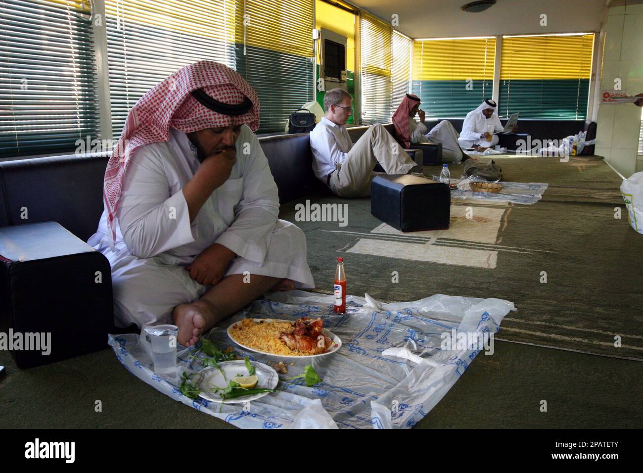 A Saudi man eats his lunch in a restaurant in Riyadh in the Kingdom of ...