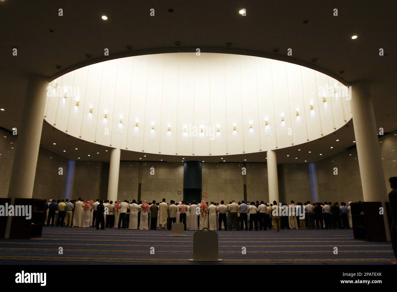 Saudi men pray in a mosque in Riyadh in the Kingdom of Saudi Arabia on ...