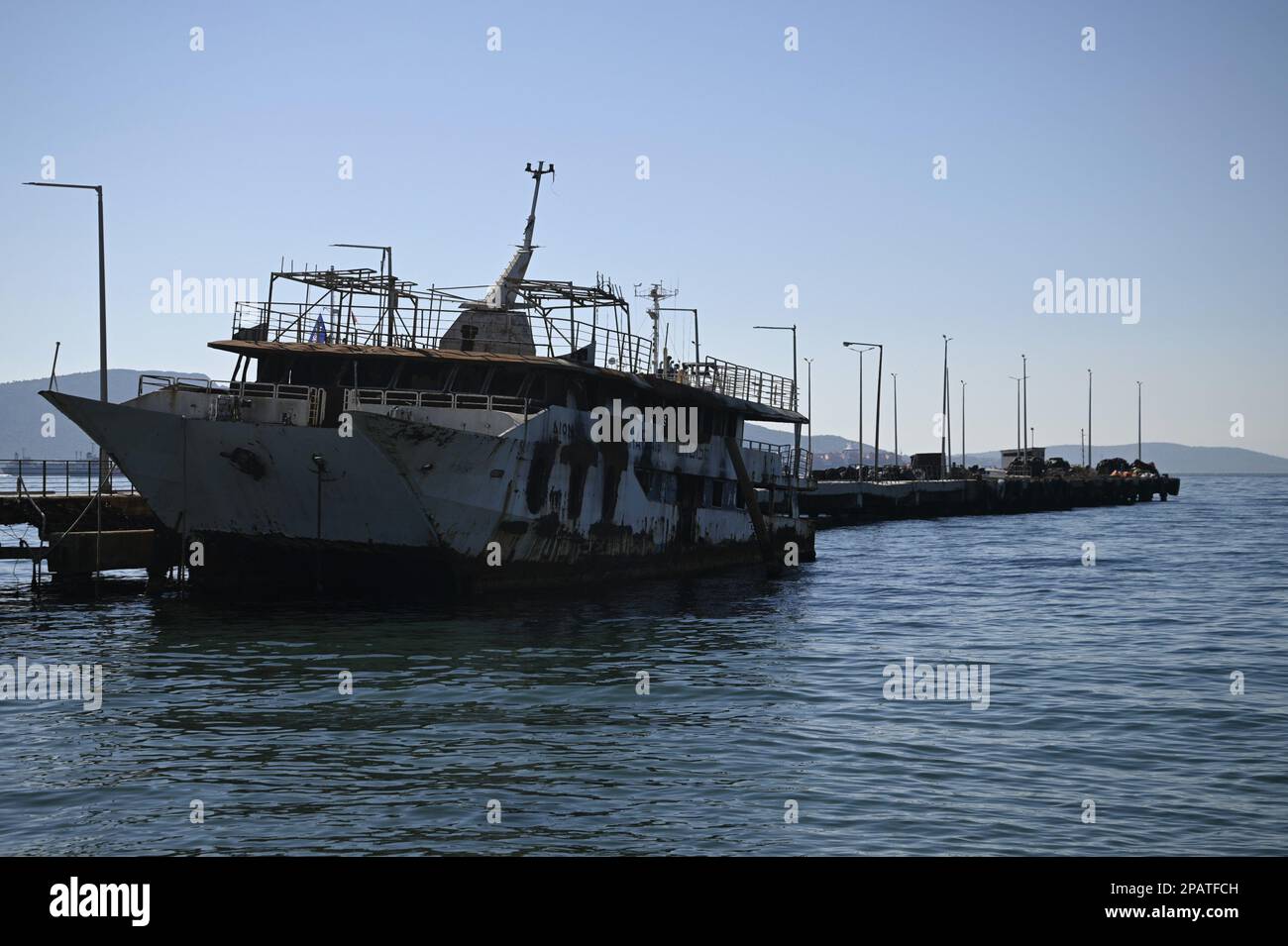 Landscape with various shipwrecks at the shallow Bay of Eleusis in ...
