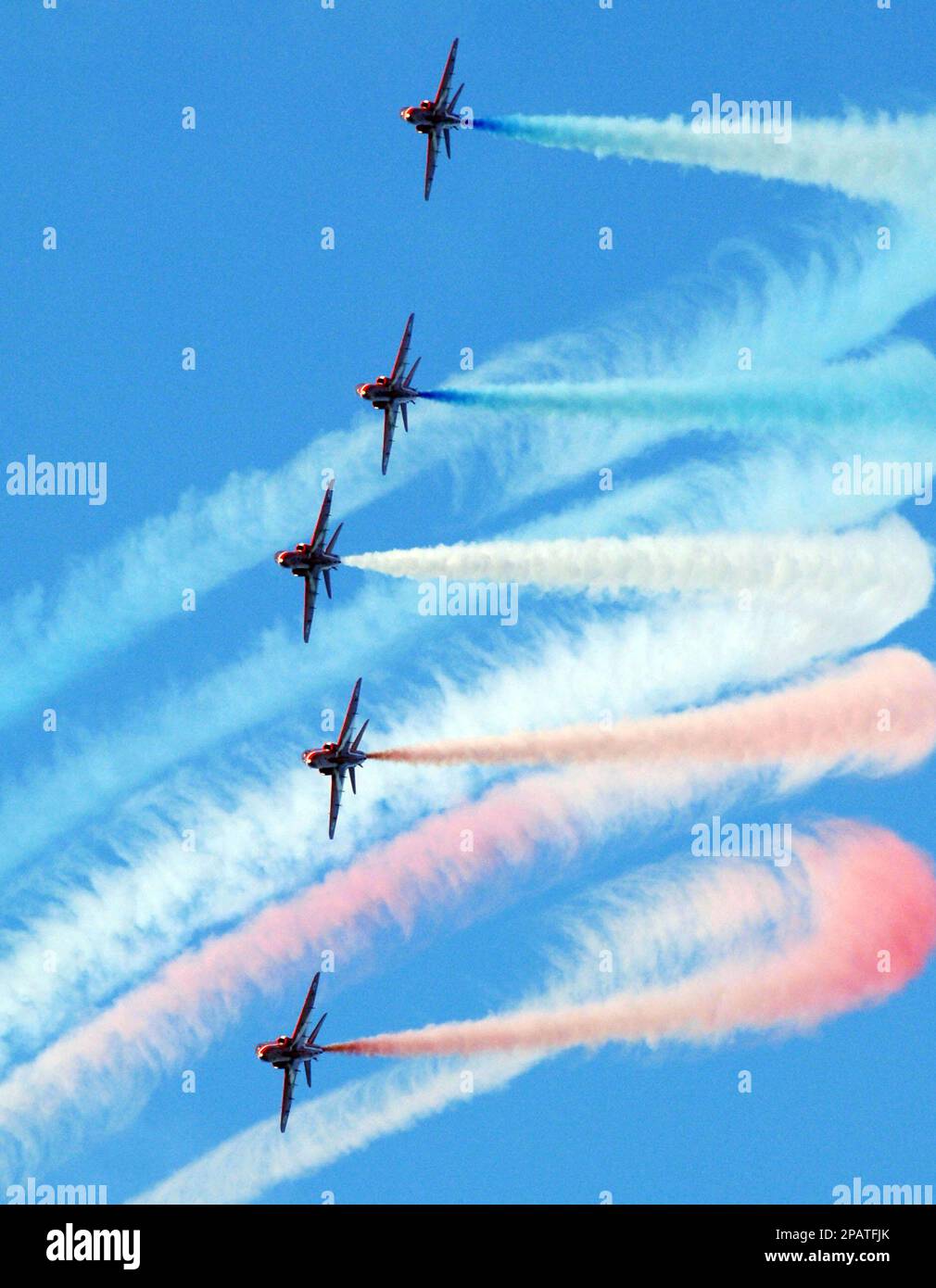 Planes from the RAF Red Arrows team perform during an air show in ...