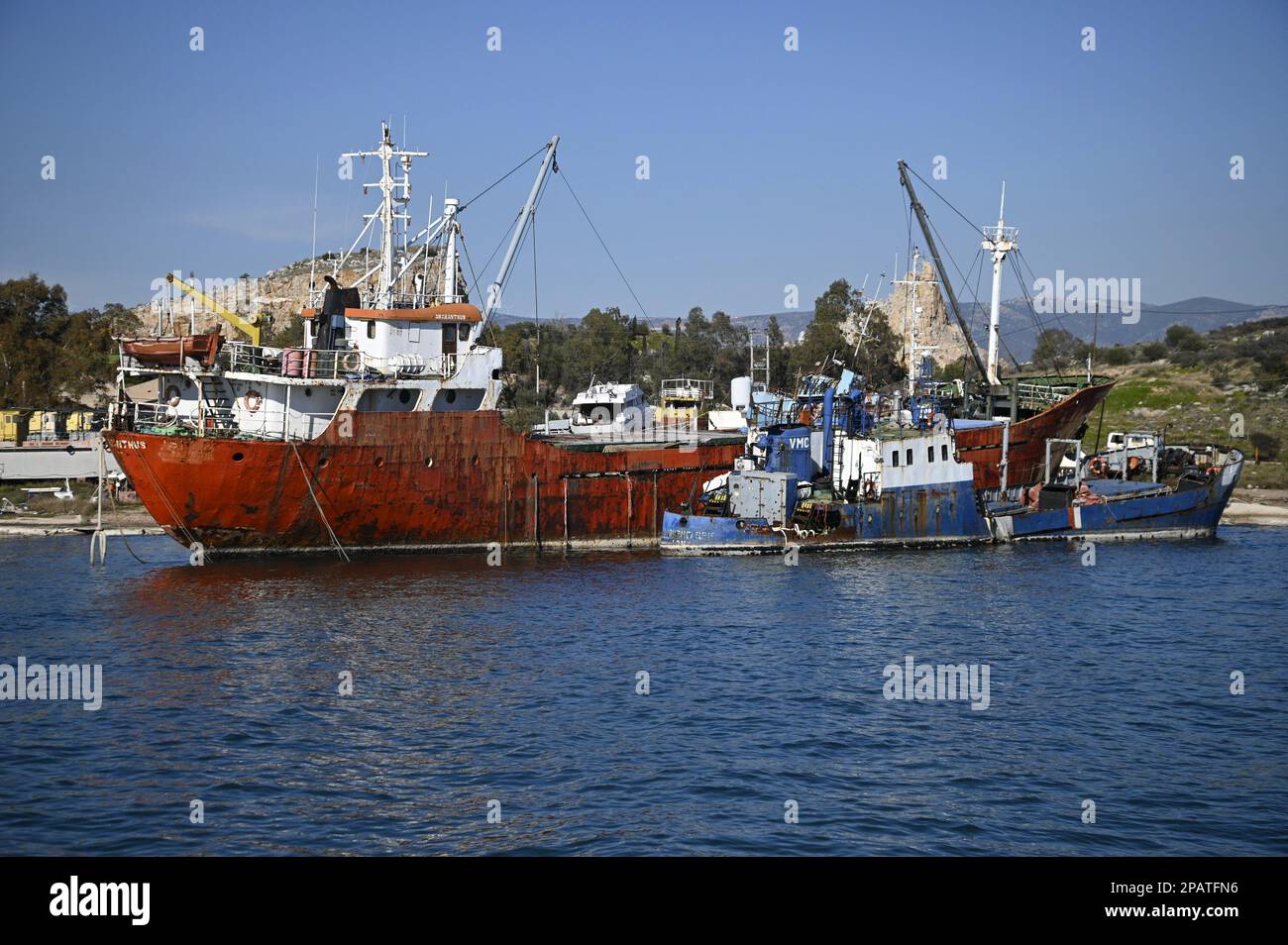 Landscape with various shipwrecks at the shallow Bay of Eleusis in ...