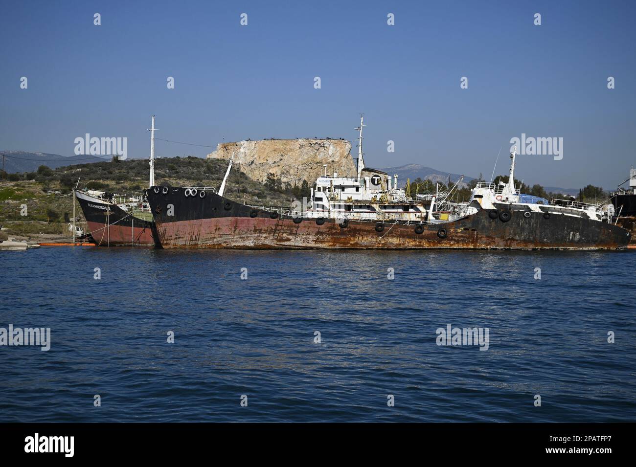 Landscape with various shipwrecks at the shallow Bay of Eleusis in ...