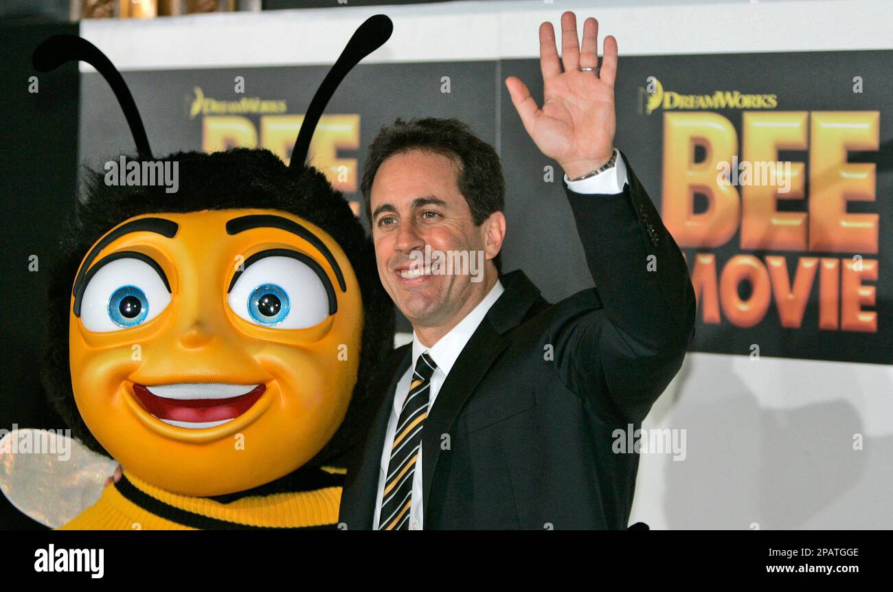 Actor Jerry Seinfeld poses with his cartoon character as he arrives at ...