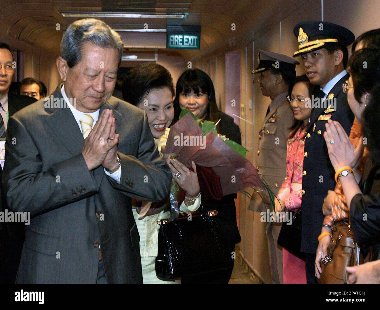 Thailand's Prime Minister Surayud Chulanont, left, and wife Chitravadee ...