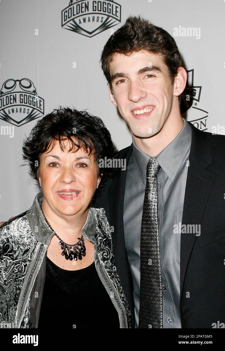 Swimmer Michael Phelps and his mother Debbie arrive at USA Swimming ...