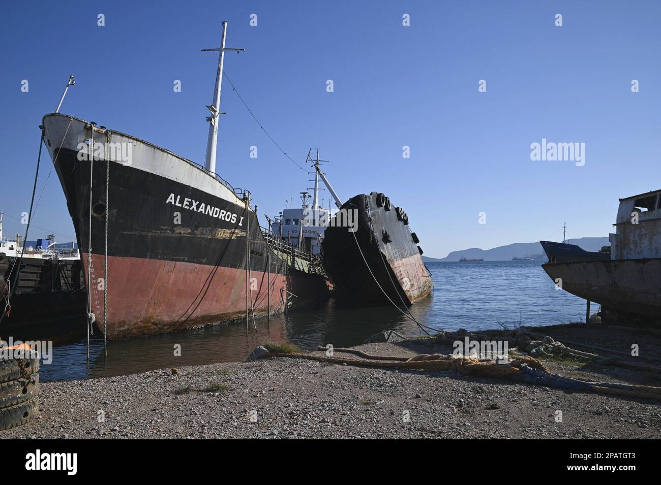 Landscape with various shipwrecks at the shallow Bay of Eleusis in ...