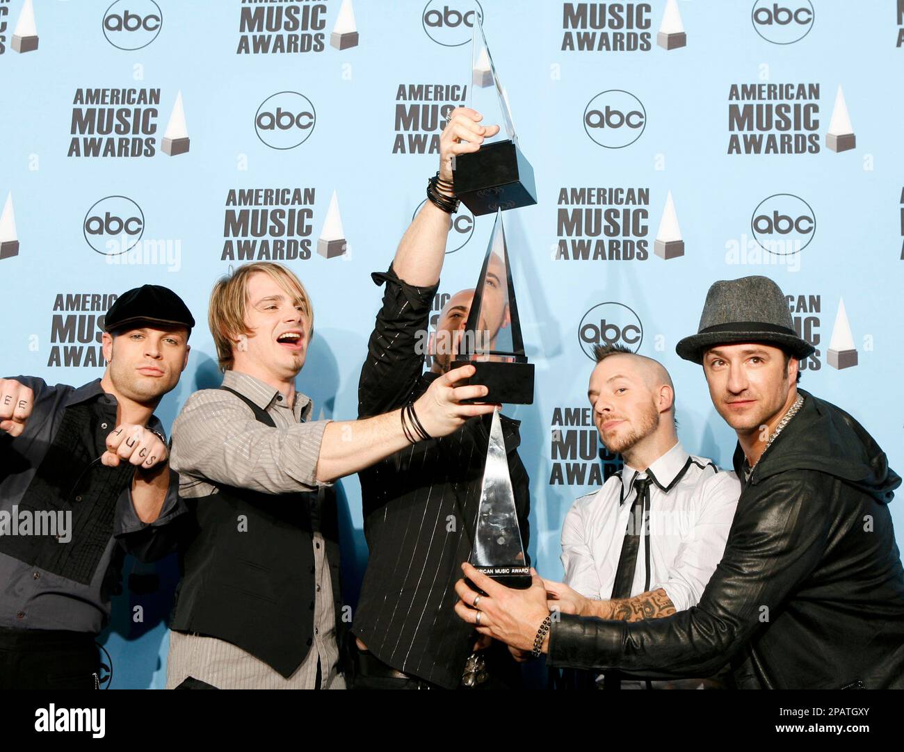 The musical group Daughtry holds their awards for favorite pop/rock ...