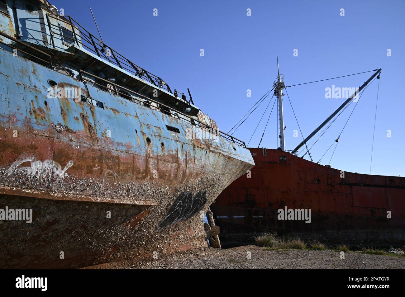 Landscape with various shipwrecks at the shallow Bay of Eleusis in ...