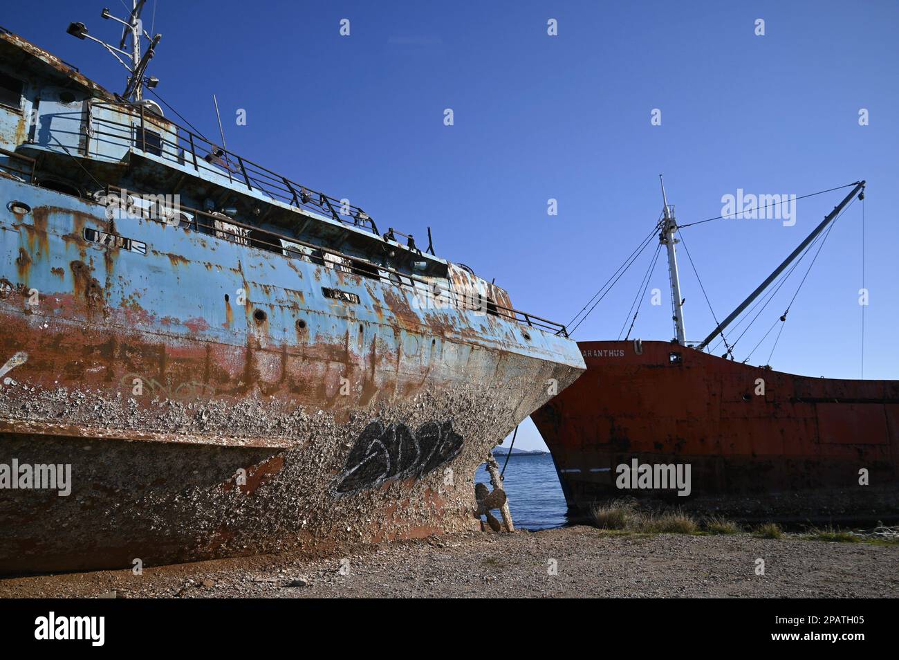 Landscape with various shipwrecks at the shallow Bay of Eleusis in ...