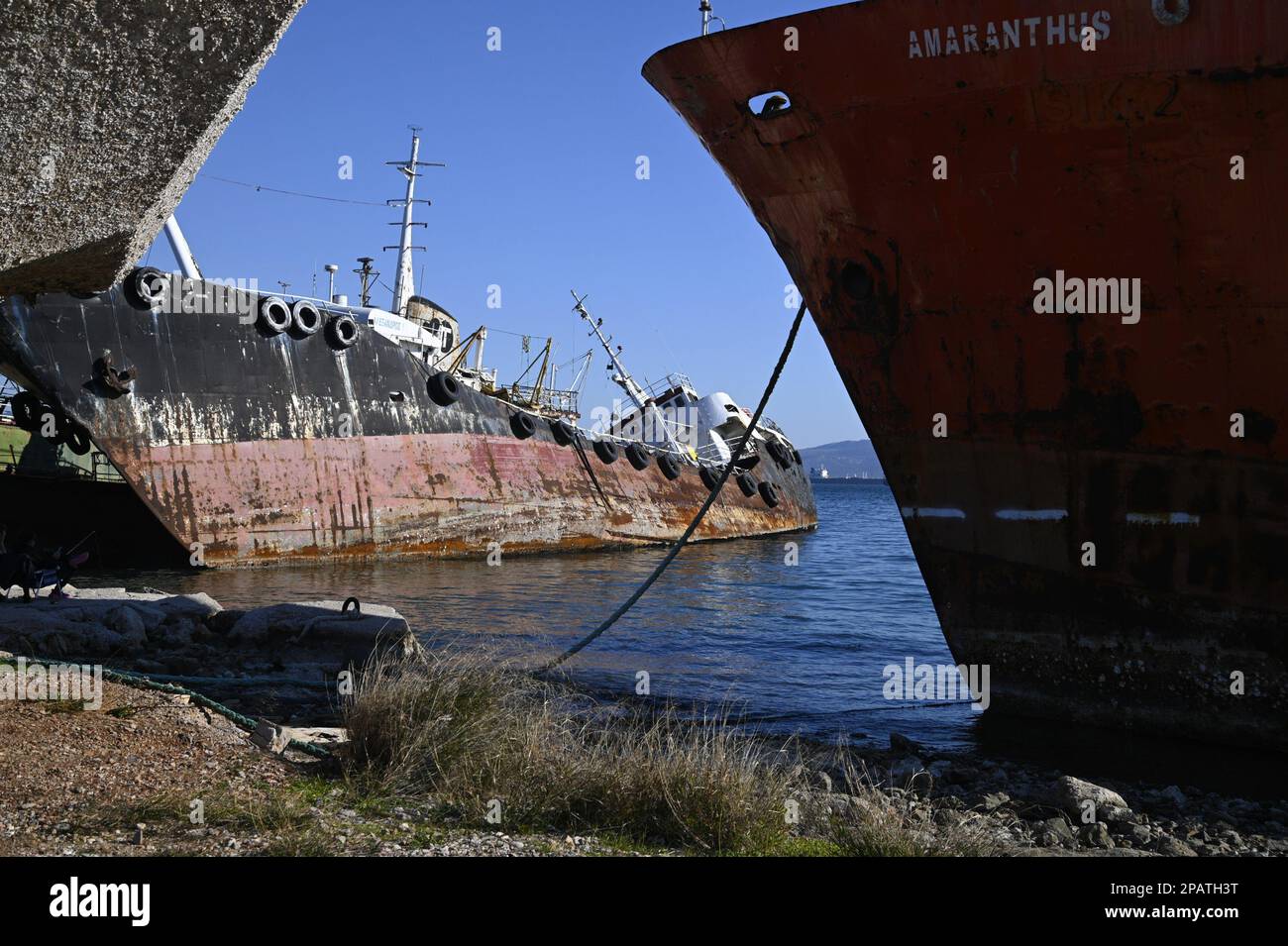 Landscape with various shipwrecks at the shallow Bay of Eleusis in ...