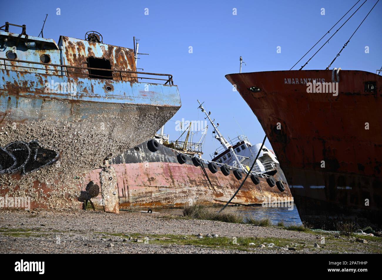 Landscape with various shipwrecks at the shallow Bay of Eleusis in ...