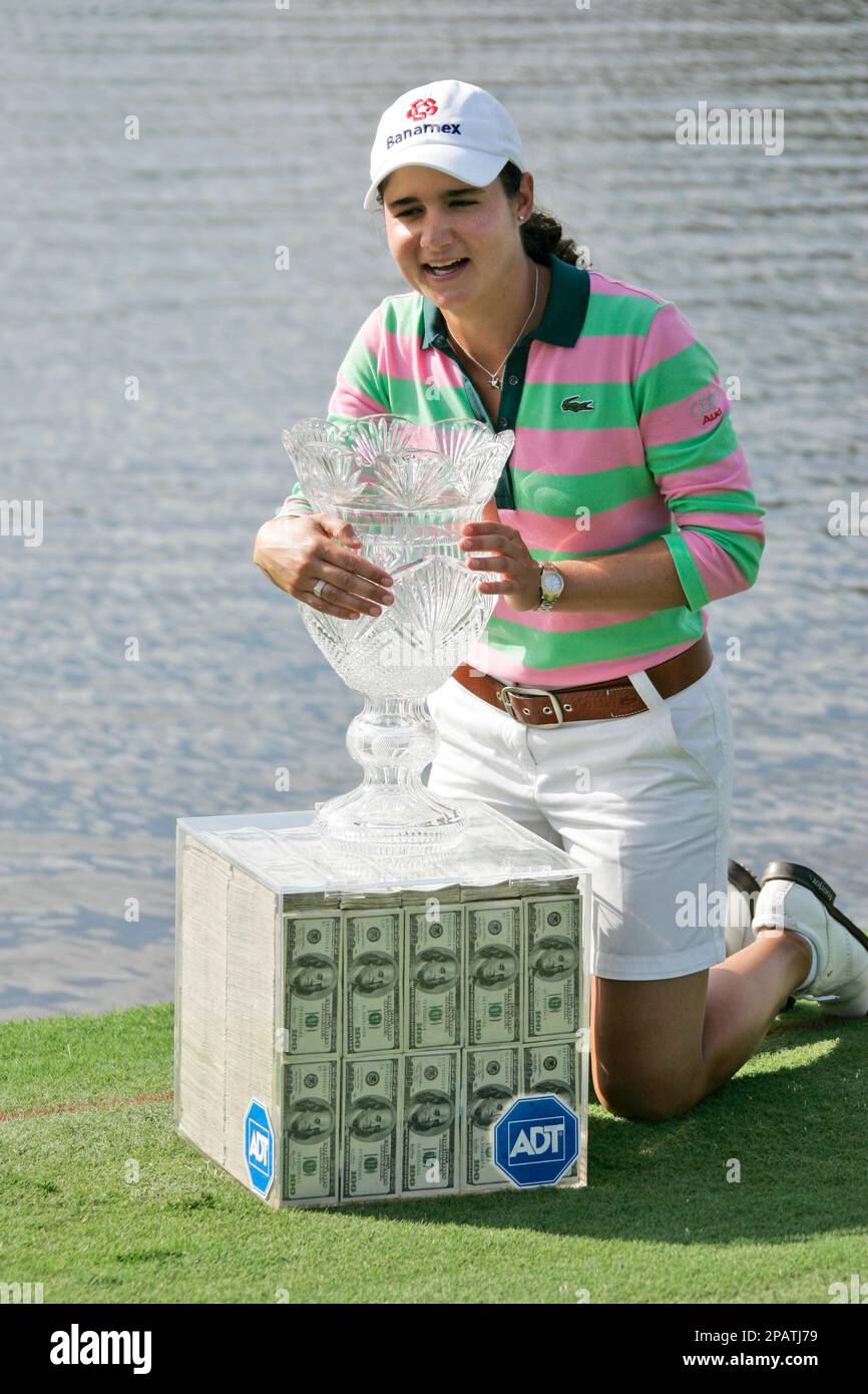 Lorena Ochoa from Mexico poses for photos after winning the ADT ...