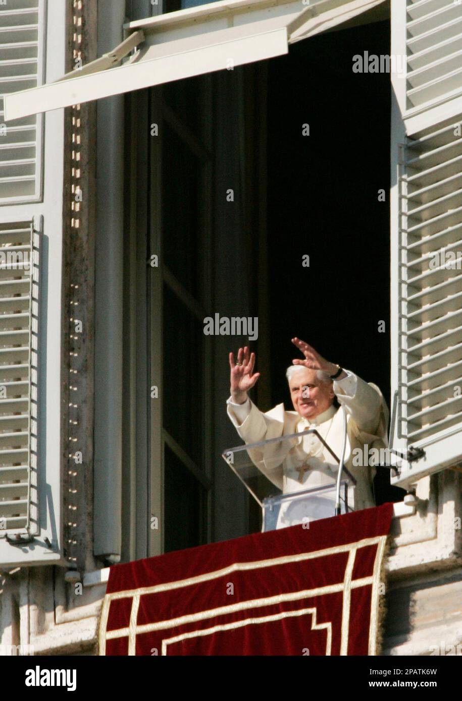 Pope Benedict XVI delivers his blessing during the traditional Angelus ...