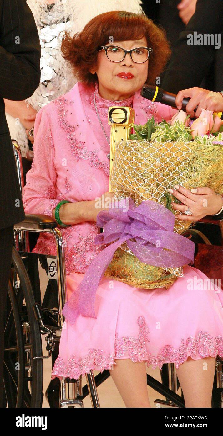 Hong Kong actress Lydia Su, sitting on a wheelchair, speaks after being ...