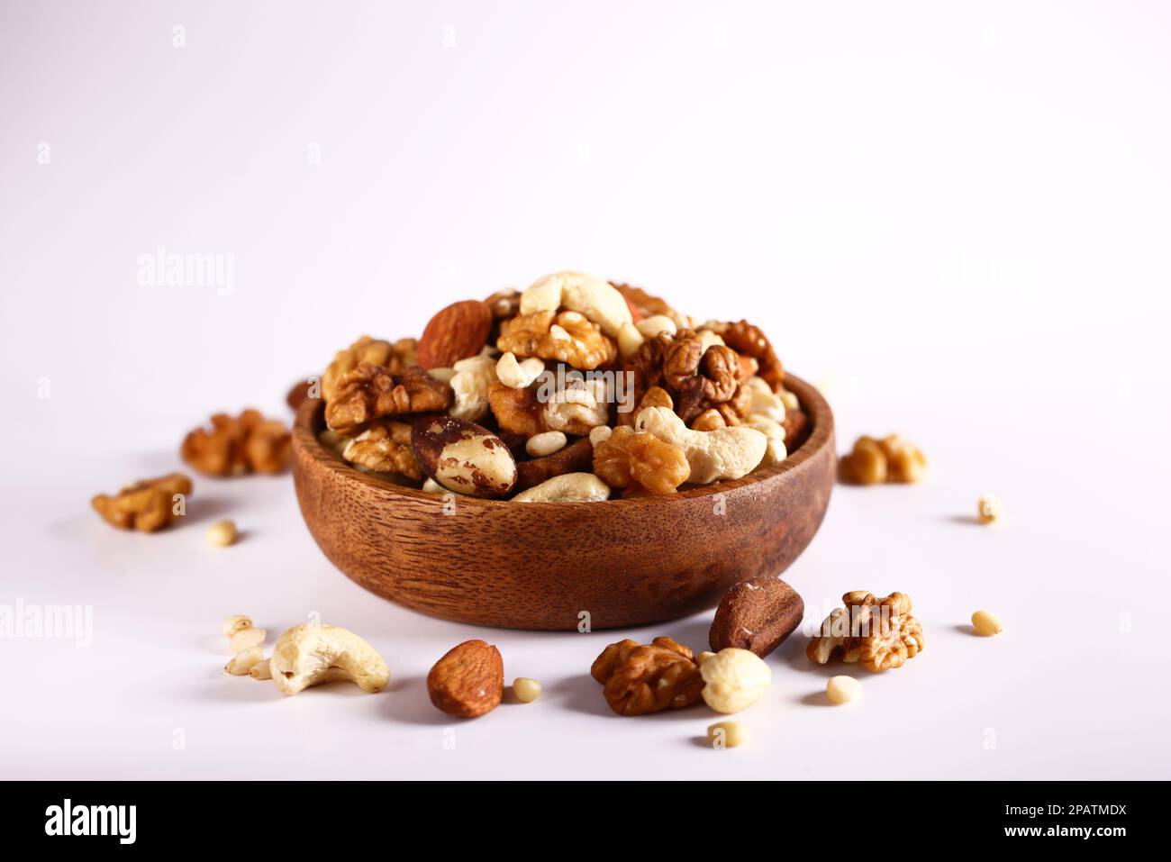 natural assorted nuts on white background Stock Photo - Alamy