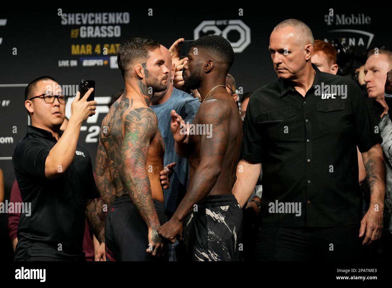 LAS VEGAS, NV - March 3: (L) Cody Garbrandt and Trevin Jones face-off at the ceremonial weigh ...